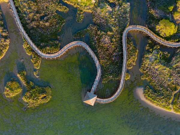 Top view of sea with wooden walkway - Aerial top view of wooden bridge ...