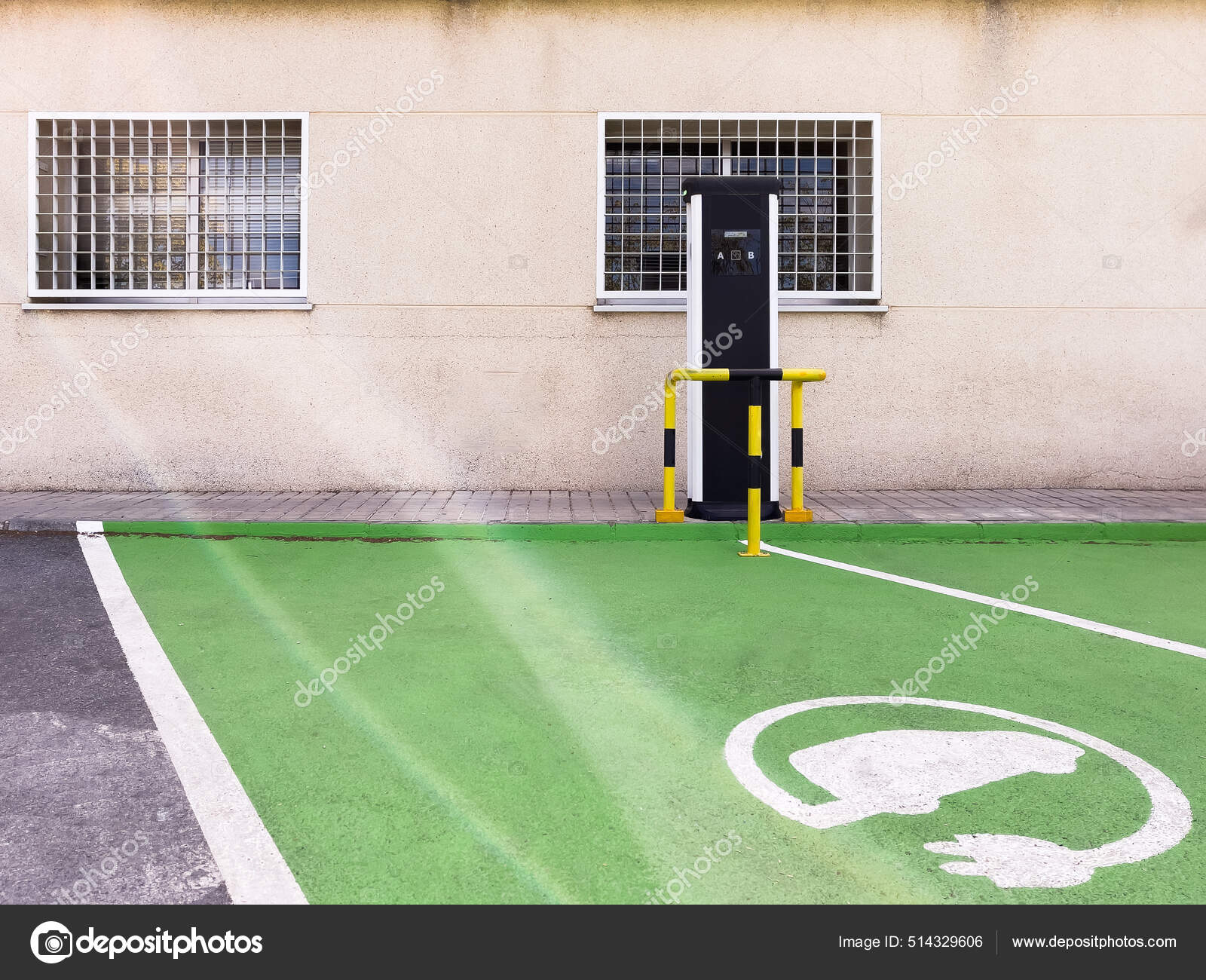 Electric car charging point in a city. road signage at an electric car ...