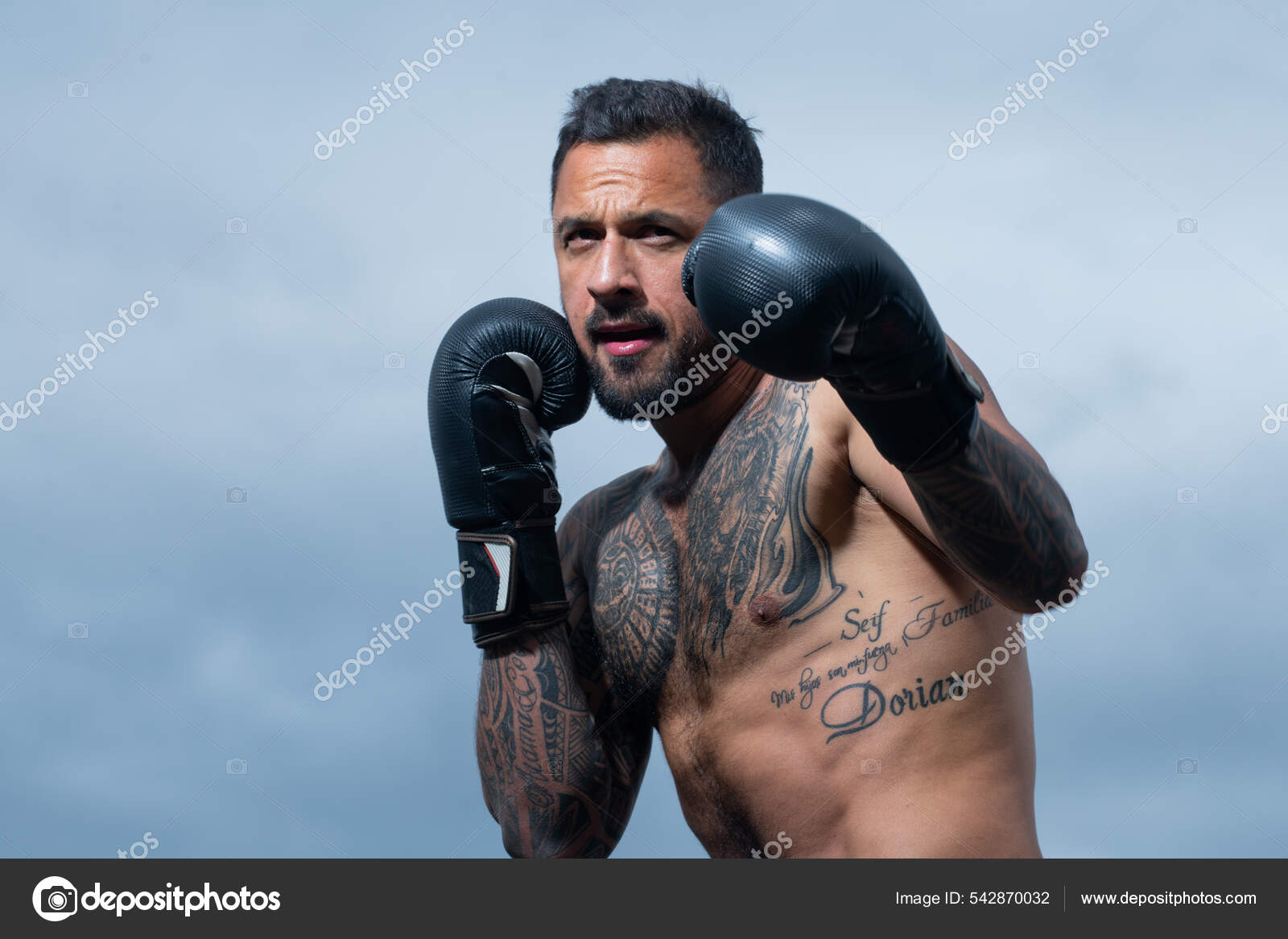 Boxer fighter training outdoors. Sportsman muay thai boxer fighting in ...