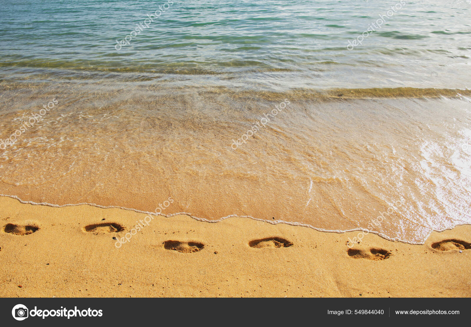 Footsteps In The Sand Sunset