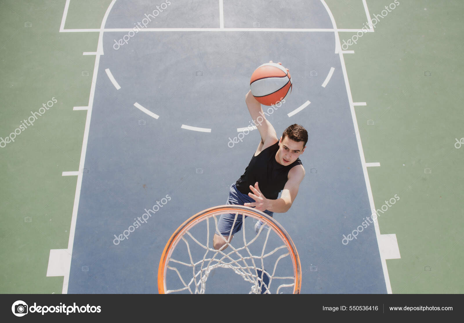 Person Shooting Basketball