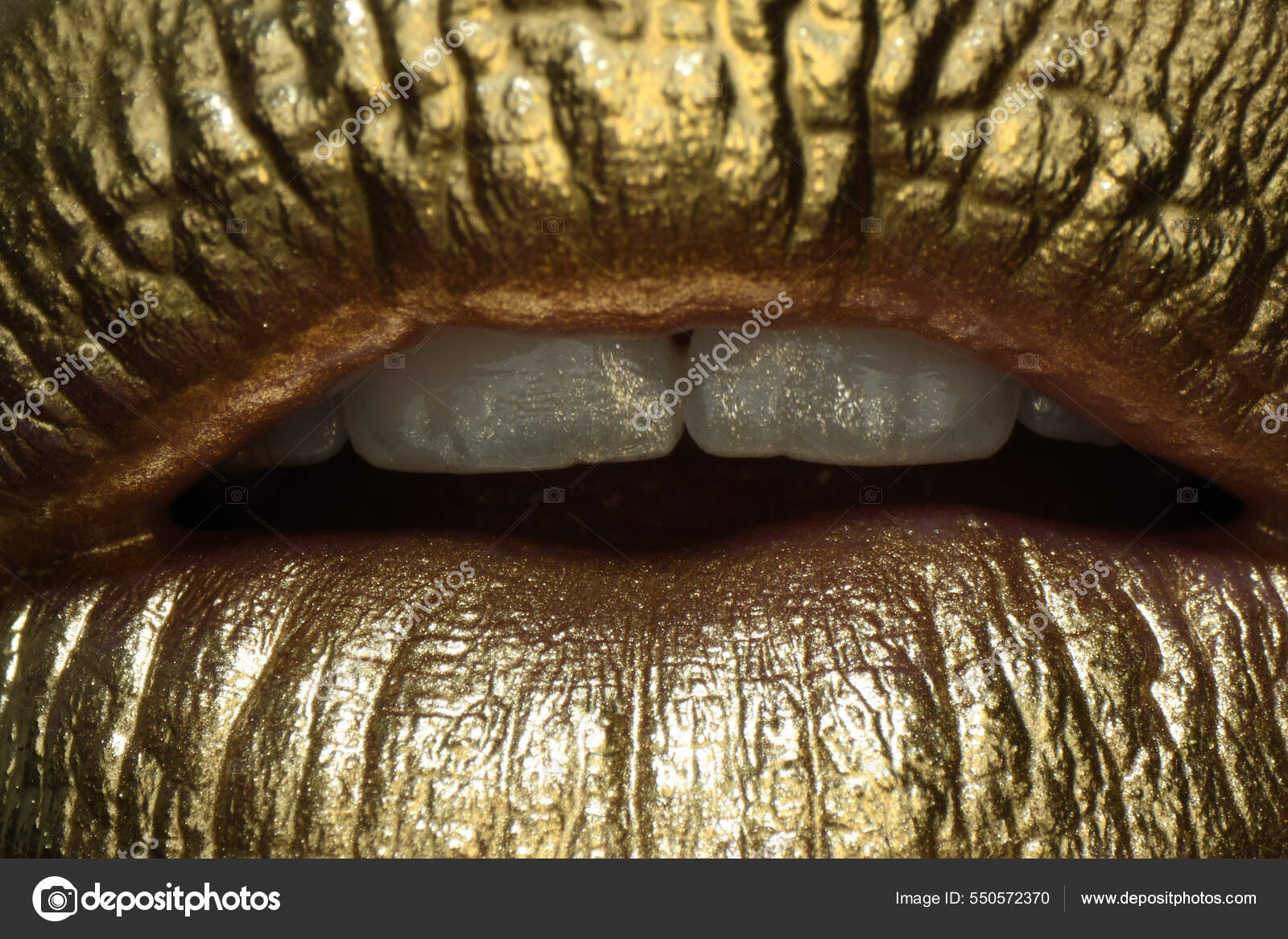 Cosmetics and make-up. Macro close up gold lips lipstick and gloss ...