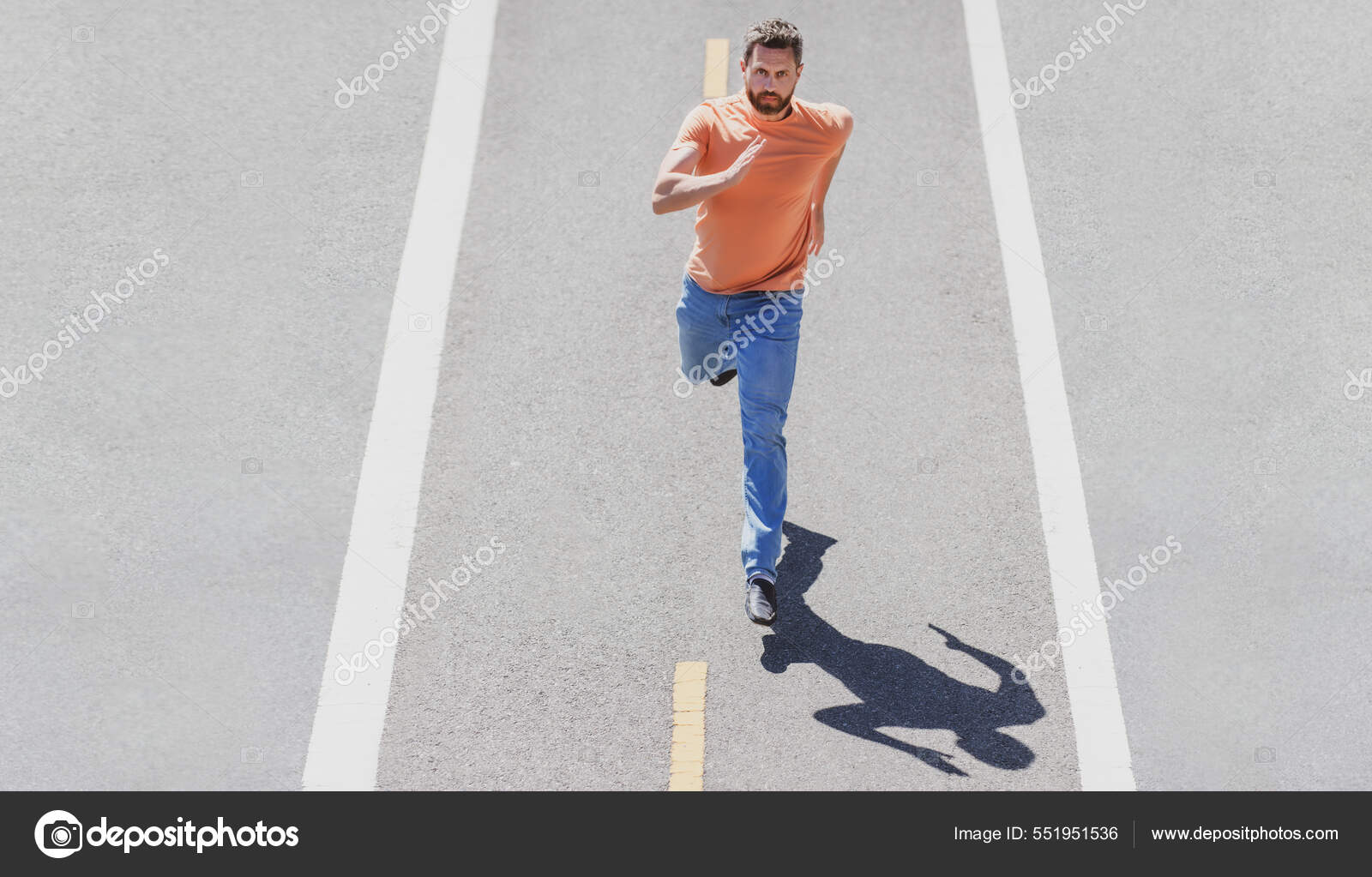 Man running on country road, sport motivation training. Runner or ...