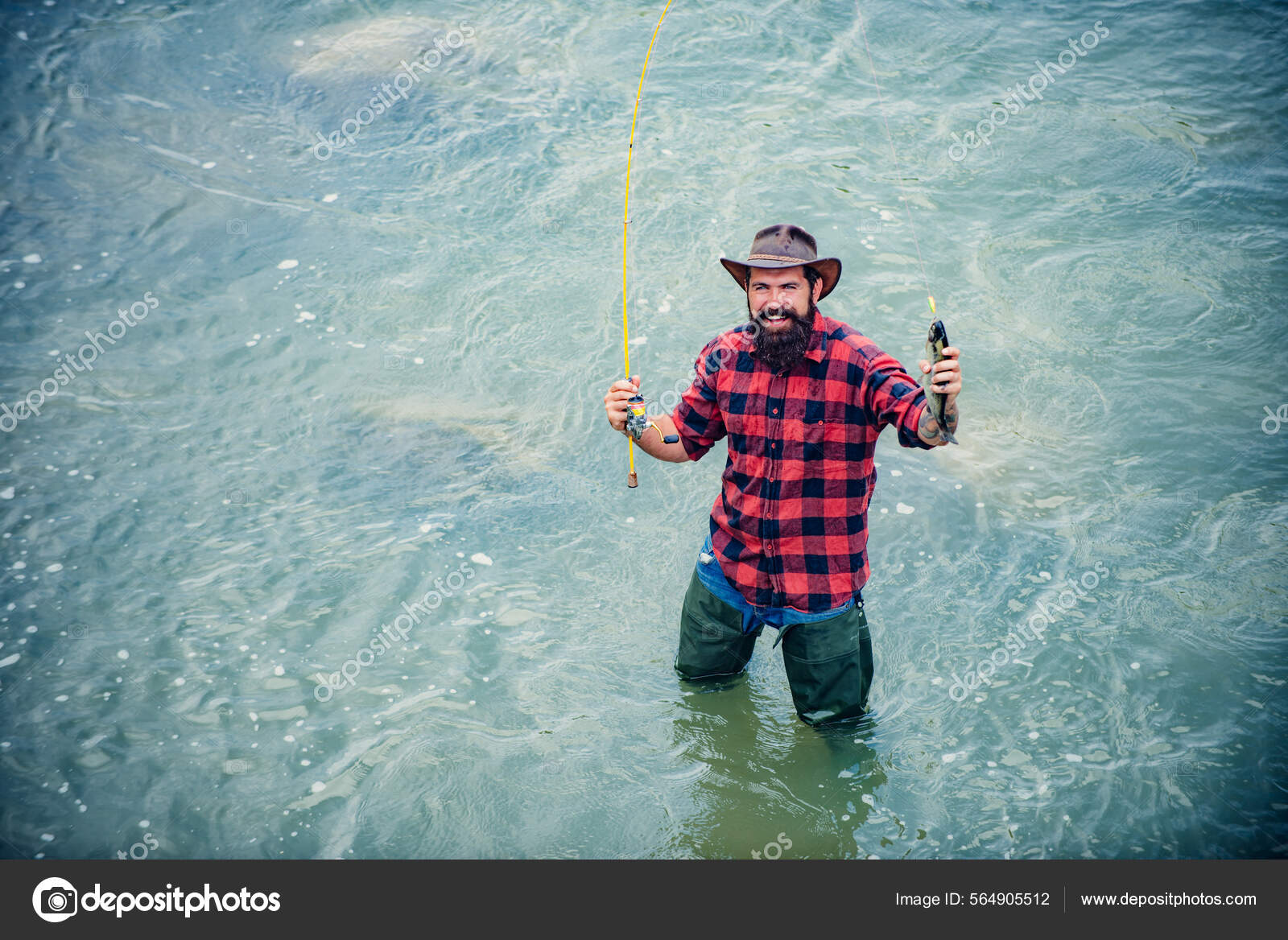 Fisherman caught a fish. Man fishing on river. Excited amazed fisher ...