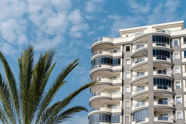 Low angle view of an apartment building with balconies. Residential ...