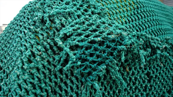 Repairing fish net Stock Photos, Royalty Free Repairing fish net Images ...