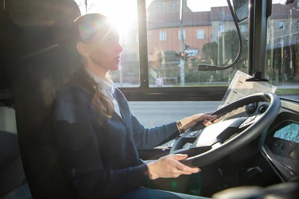 female bus driver driving a bus - Stock Image - Everypixel