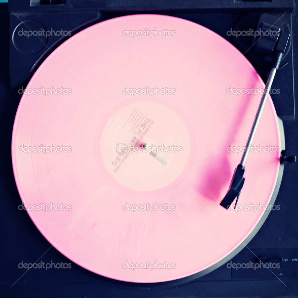 Retro turntable with pink vinyl Stock Photo by ©andrekaphoto 50552025