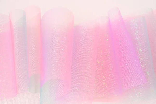 Tulle fabric.iridescent gradient texture.Shiny pink fabric with ...