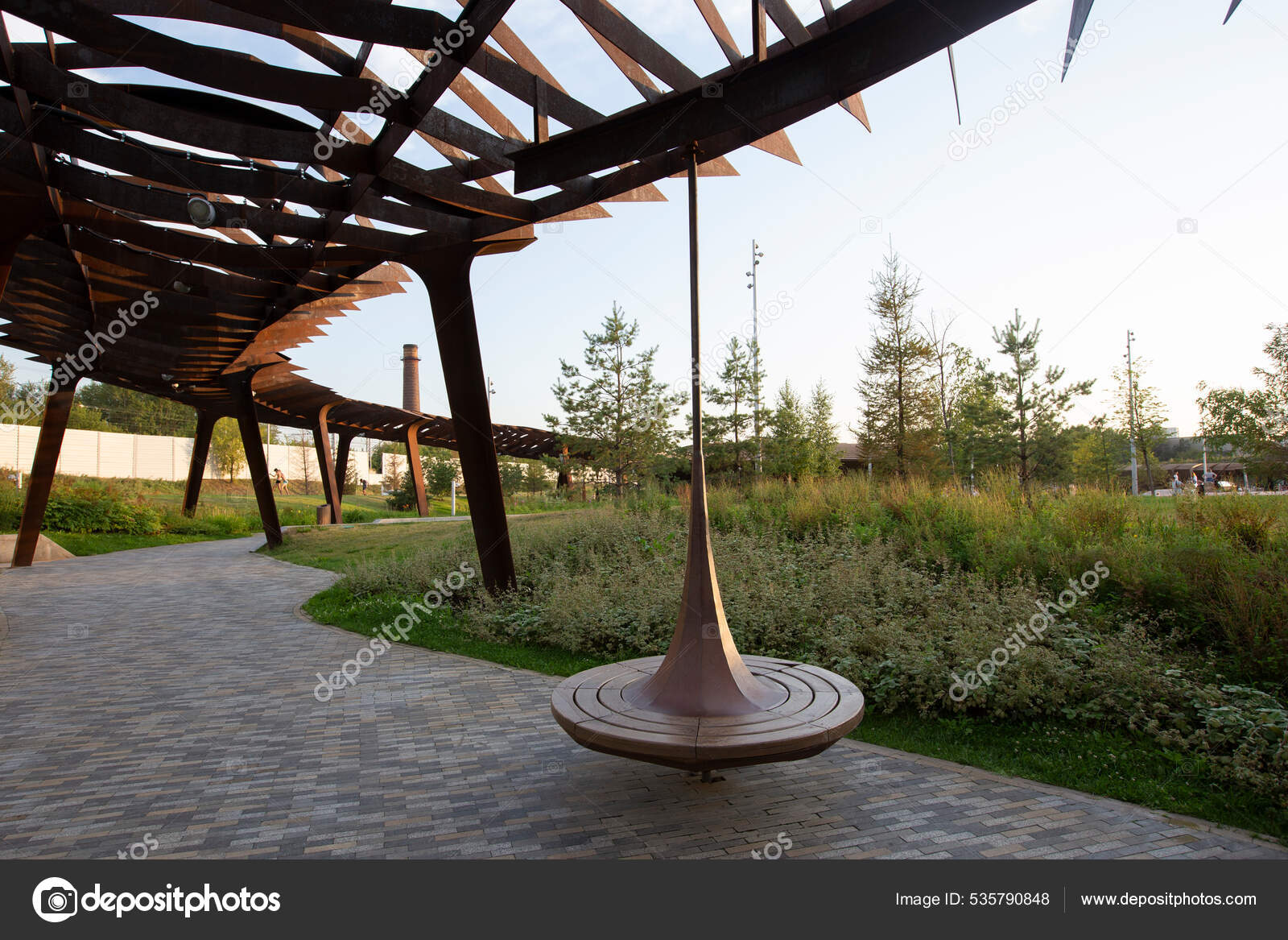 Spinning Wooden Bench Metal Pergola Walkway Grass Lawn Bushes Plants ...