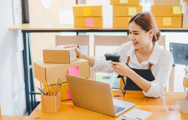 Small business owners online are scanning barcode-labelled parcel boxes ...