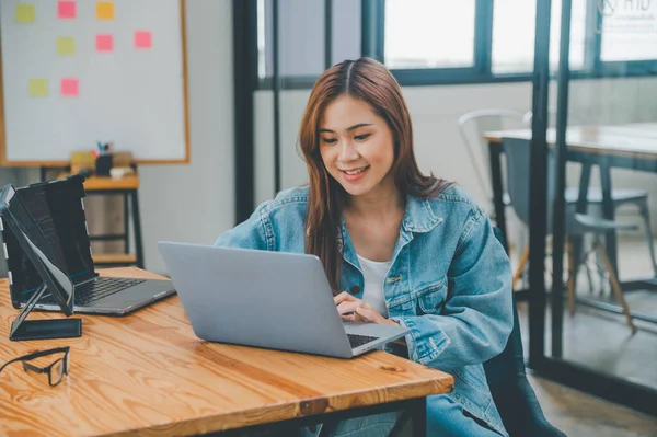 Female programmer working on coding, software development and web design.Concept technology ...