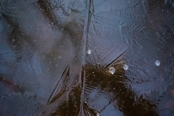 Ice puddle Stock Photos, Royalty Free Ice puddle Images | Depositphotos