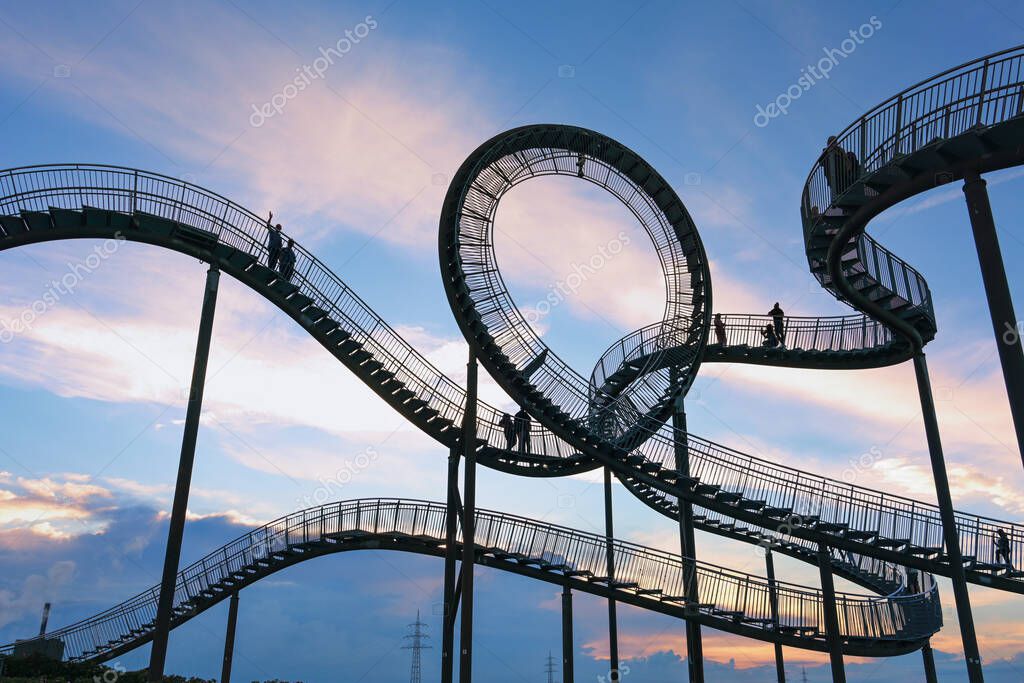 Tiger and Turtle, people as silhouettes on the stairs of the walkable ...