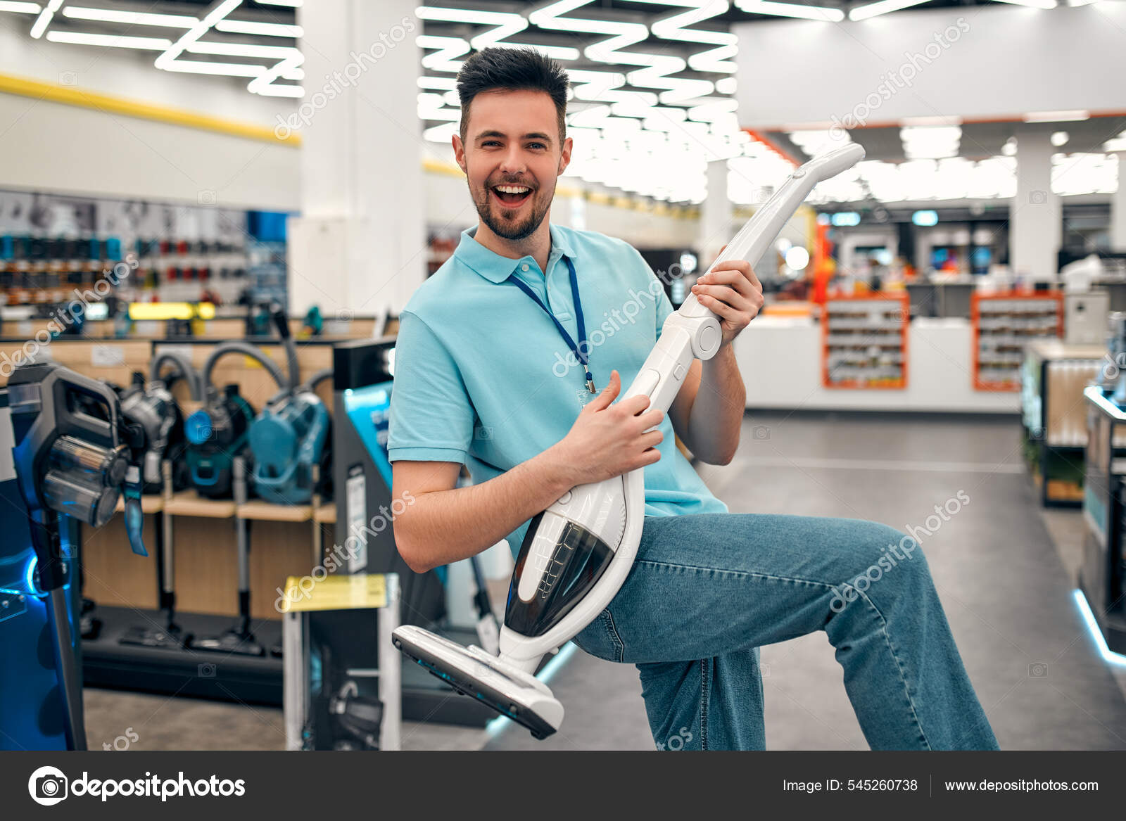 Young Successful Sales Assistant Uniform Having Fun Playing Vacuum ...