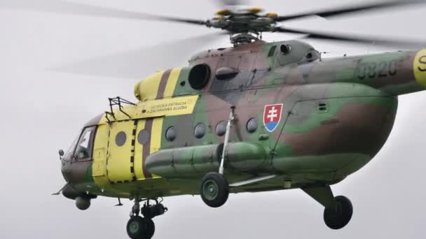 Soviet search and rescue helicopter rotating in stationary hovering ...