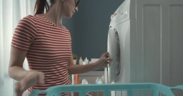 Woman finds stained clothes in the washing machine — Stock Video ...