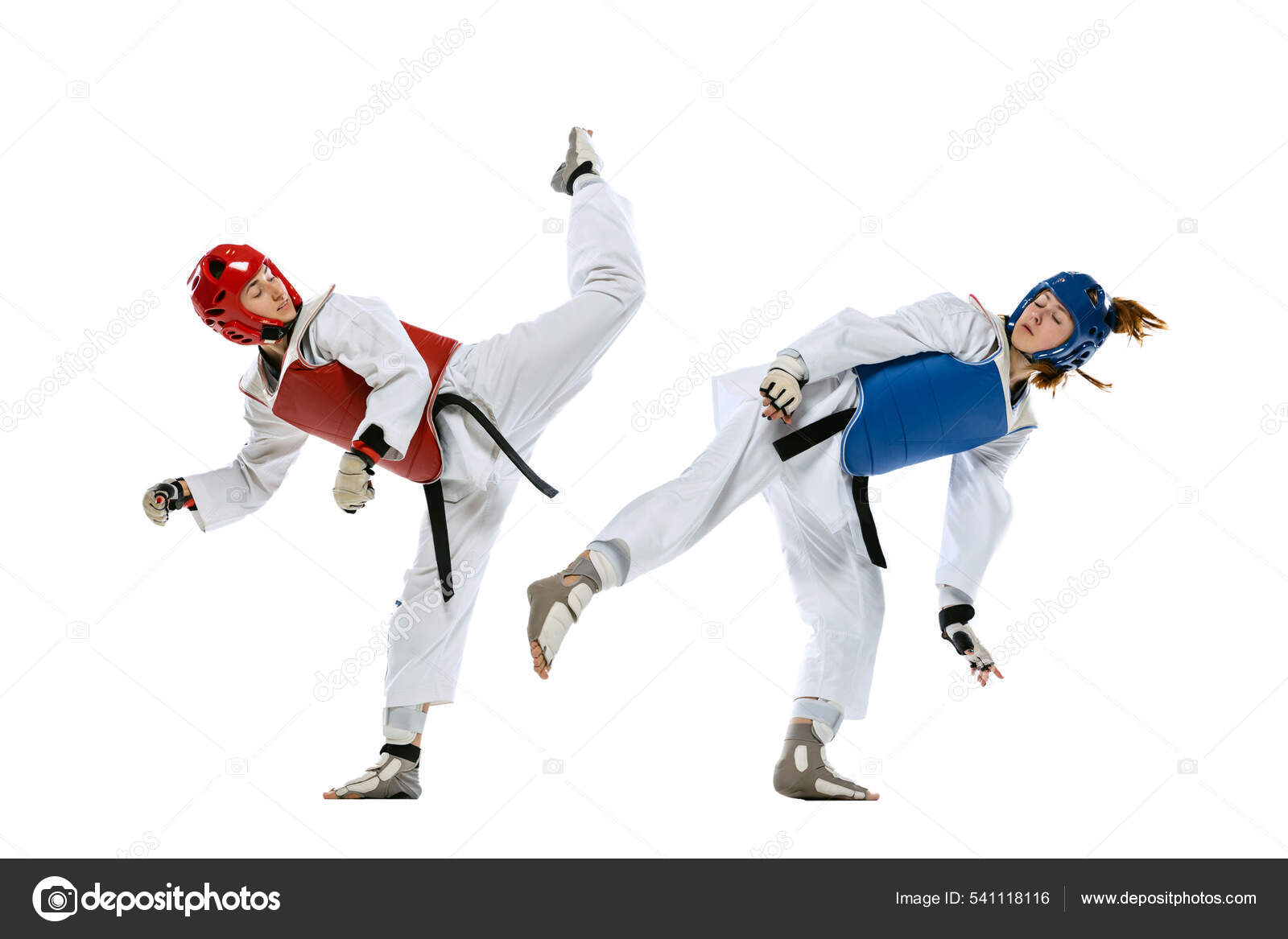 Dynamic portrait of two young women, taekwondo athletes training ...