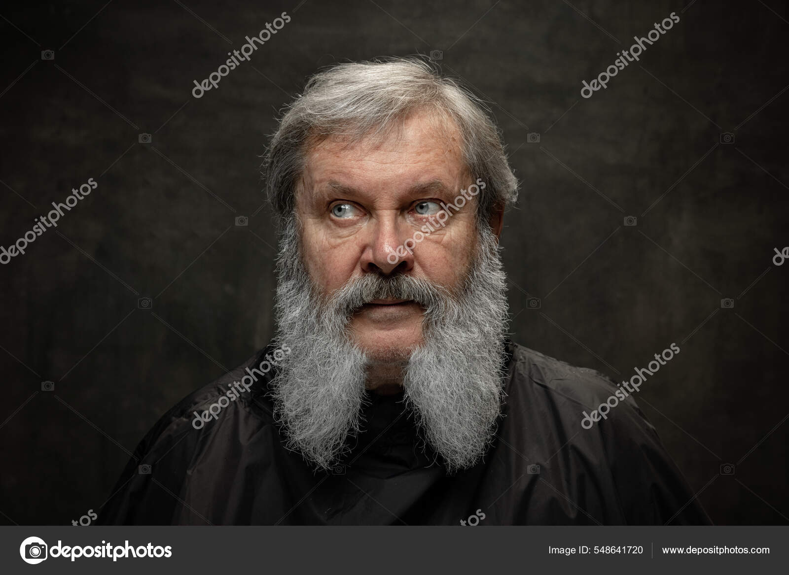 Dramatic portrait of emotional senior bearded man getting beard ...
