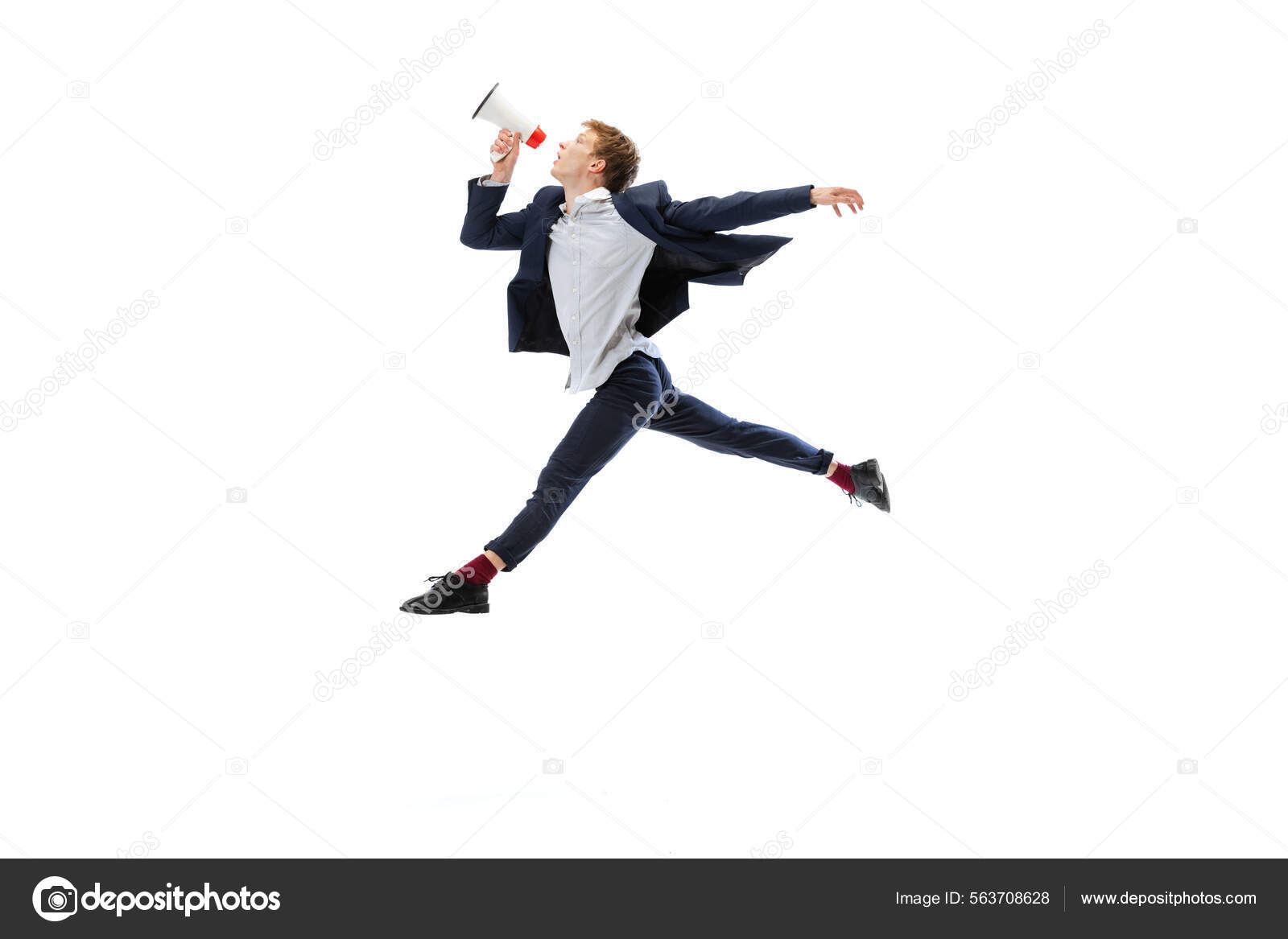 Man in office style clothes jumping and dancing isolated on white ...