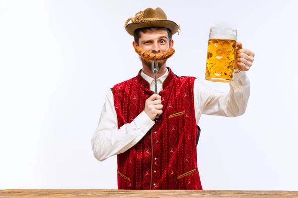 Funny. Happy man wearing traditional fest Bavarian or German outfit ...