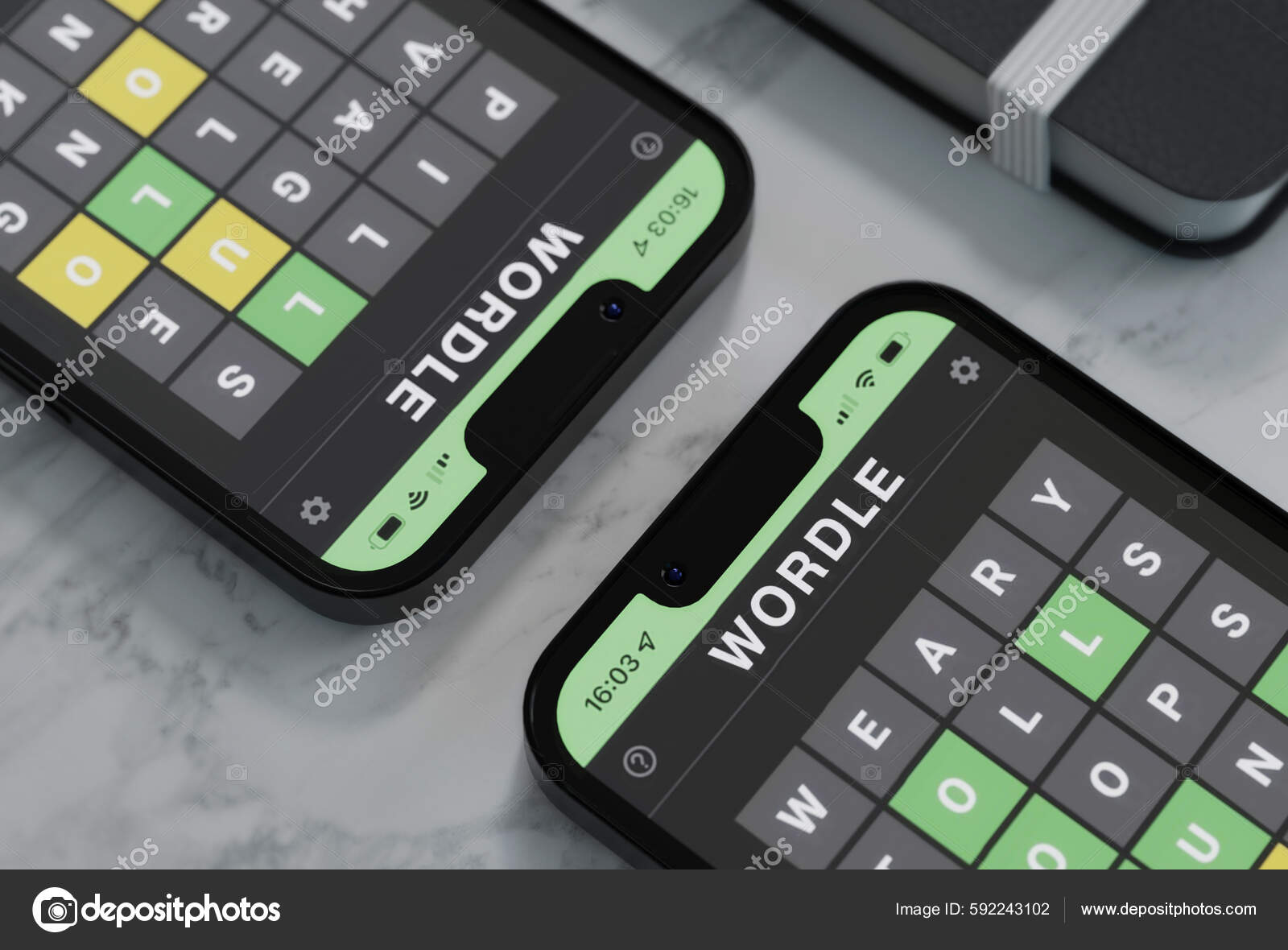 Wordle Game Double Phone Screen — Stock Editorial Photo ...