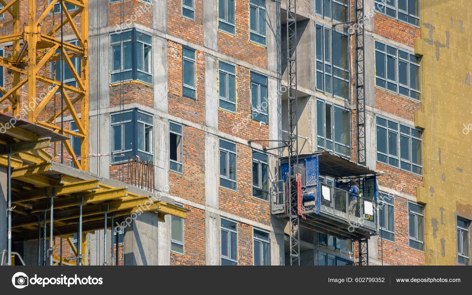 Construction Workers Moving Elevator Facade Windows Stock Photo by ...