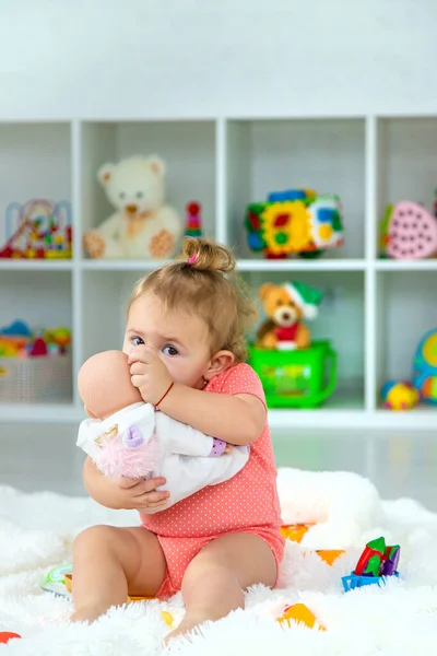 Babies hugging toys Stock Photos, Royalty Free Babies hugging toys ...