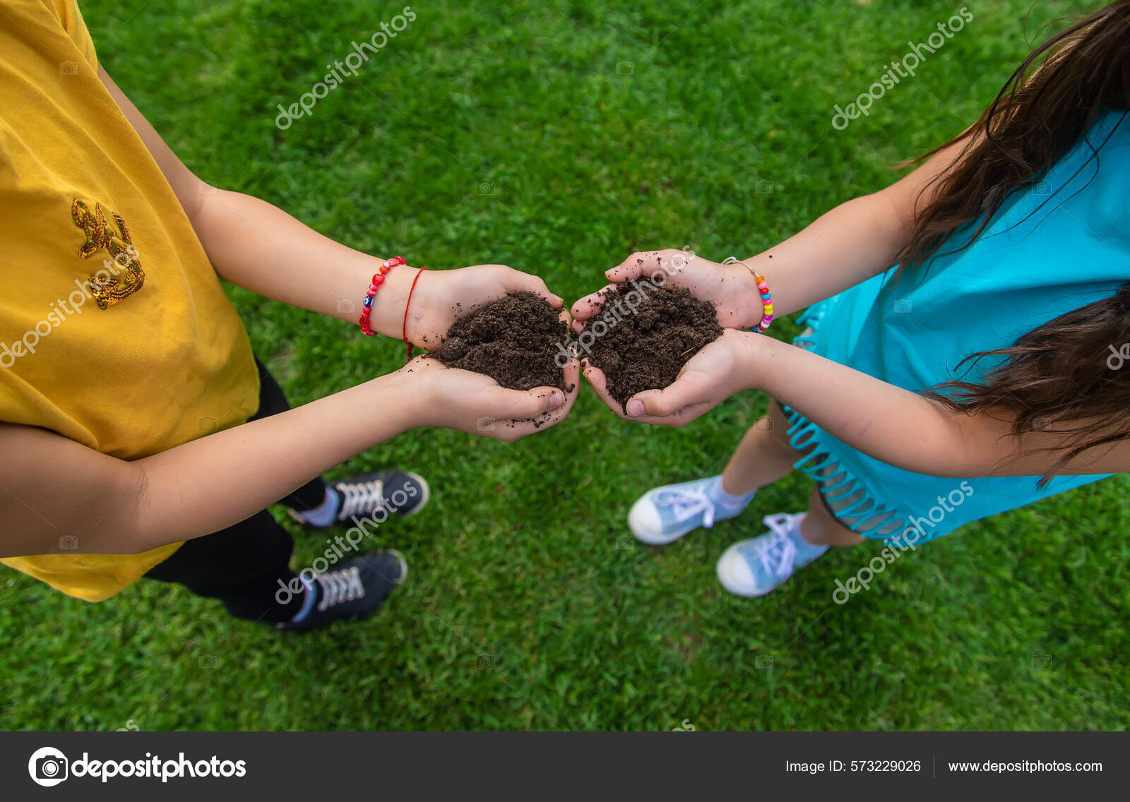 Child Holds Soil His Hands Selective Focus Kid Stock Photo by ©yana ...