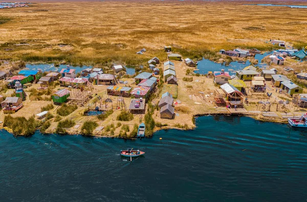 Aerial view of the Uros Straw Floating Islands on Lake Titicaca near ...