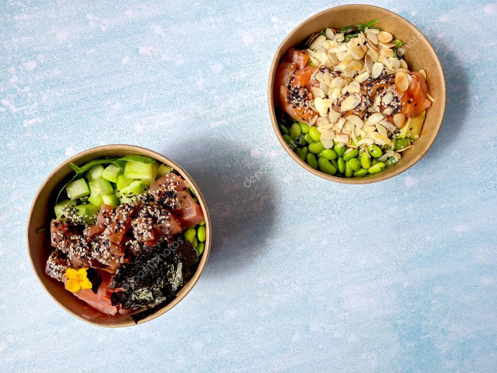Top view of wok box, bowl of rice on black background. Rice fried and ...