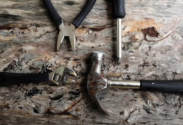 Carpentry hardware that has a black rubber coated handle. Isolated with ...