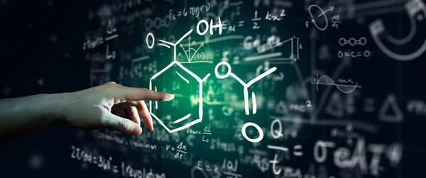 Hand on science formula and math equation abstract black board ...