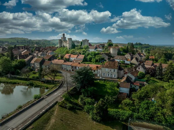 Aerial view of Billy castle in Central France with donjon, four semi ...