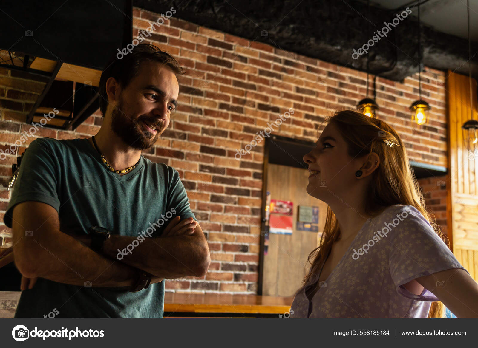 Side View Positive Young Couple Talking Each Other While Waiting ...
