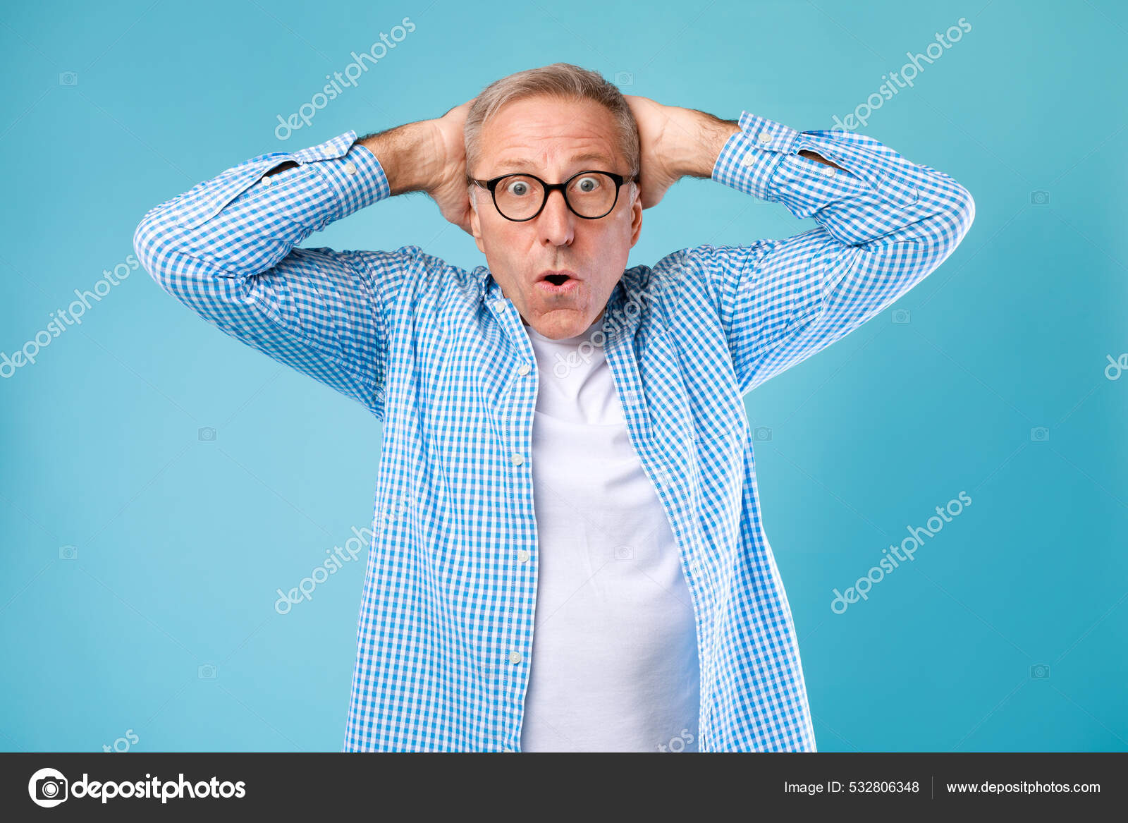 Surprised mature man in glasses staring at camera Stock Photo by ...