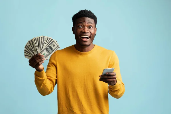 Black Man Holding Money