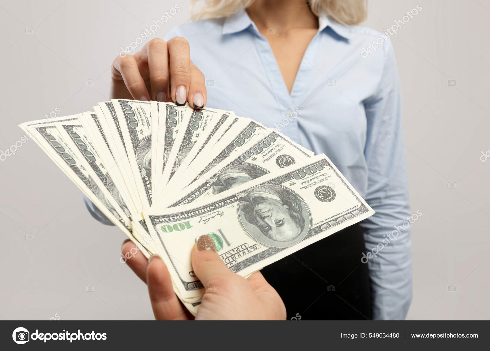 Corruption and bribery concept. Lady giving money to businesswoman over ...