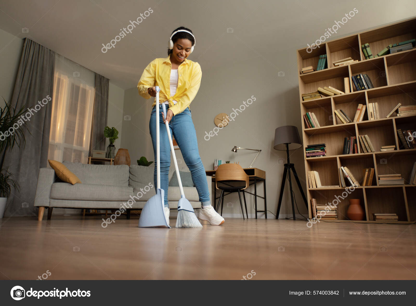 Woman Sweeping The Floor