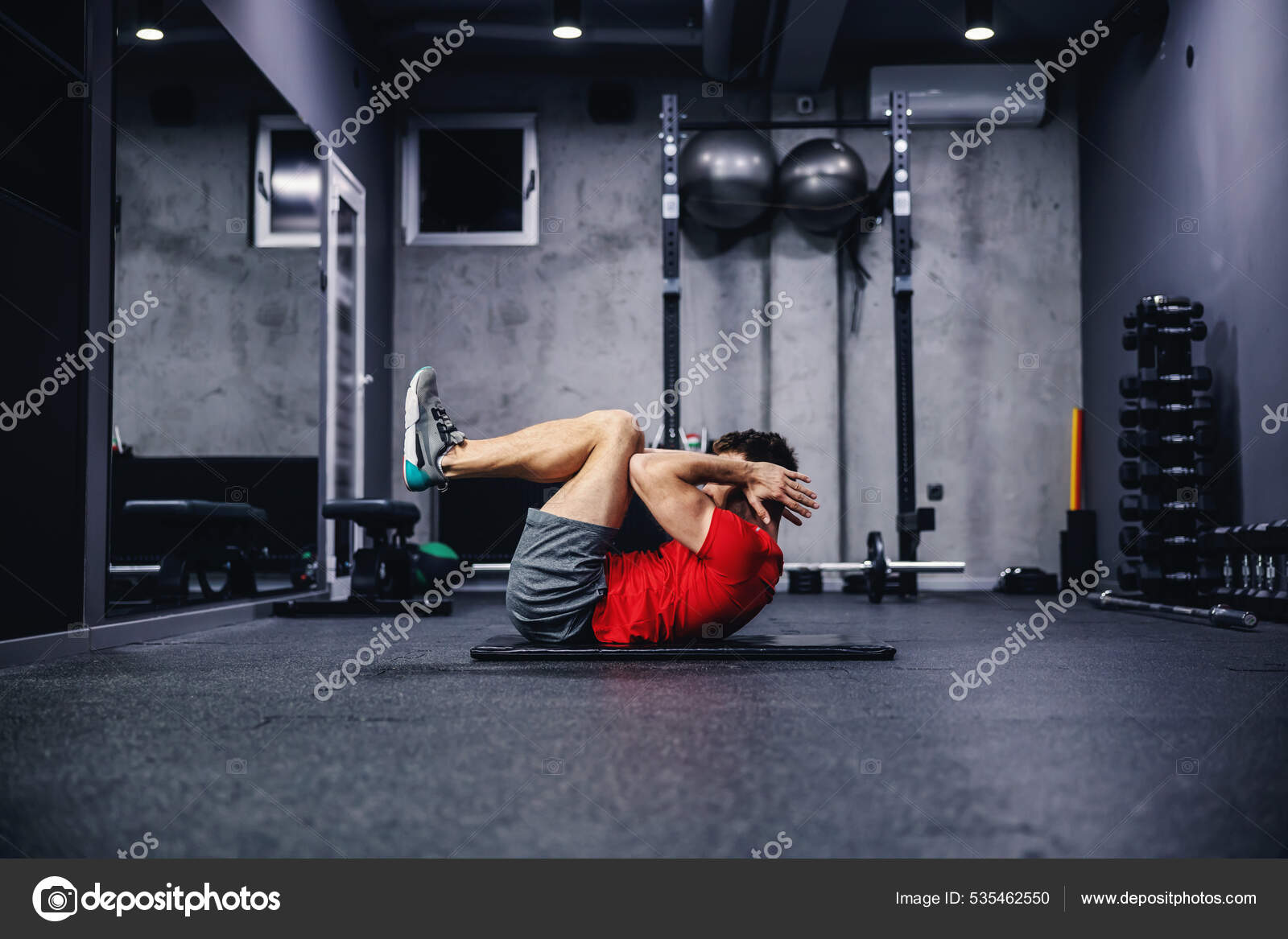 Young Handsome Sportsman Exercises Doing Abdominal Crunches Does Sit ...