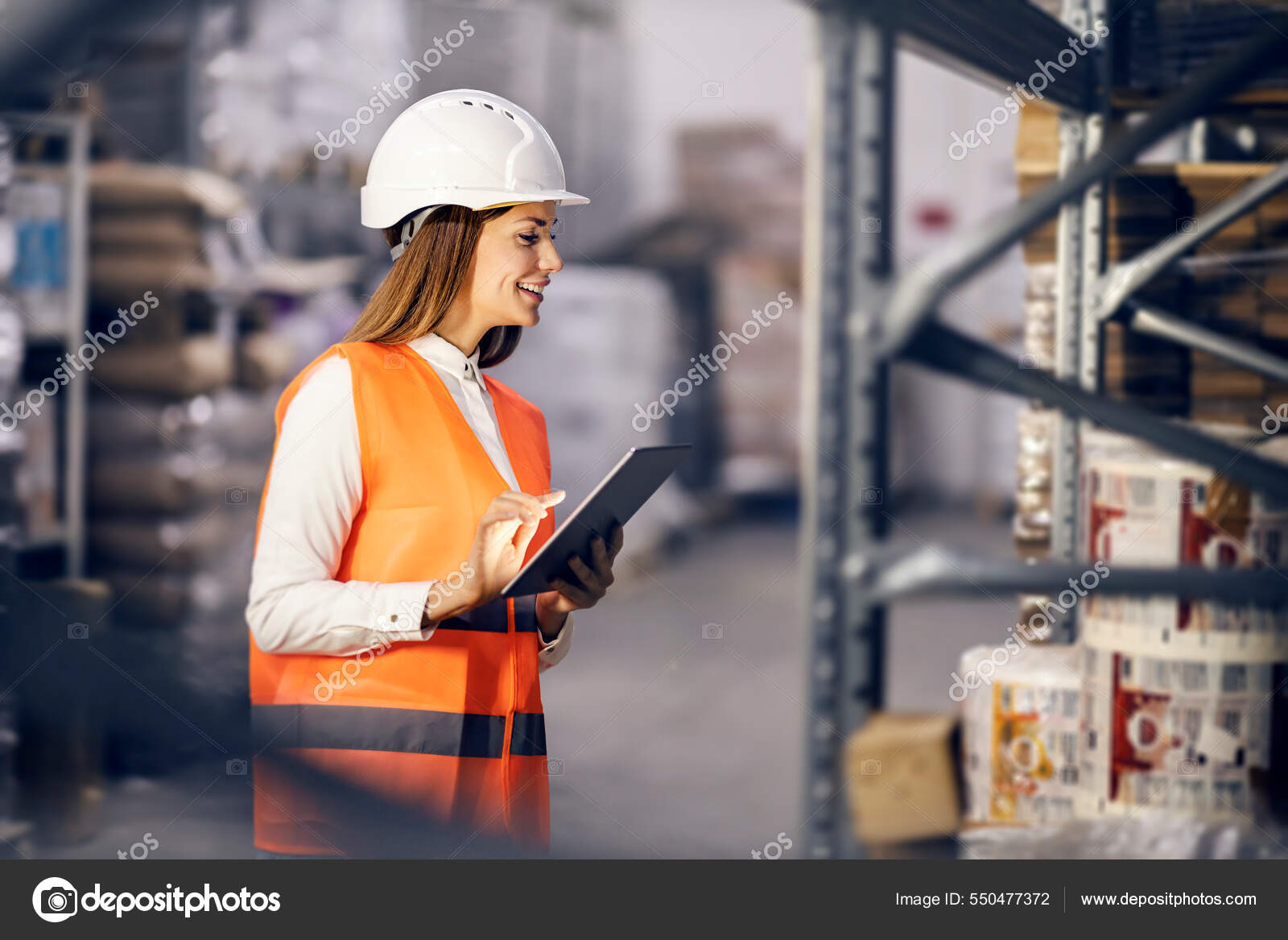 Female Supervisor Adding Order Her Tablet Storage Stock Photo by ...