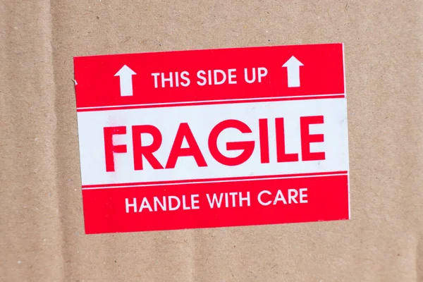 Frágil manéjese con cuidado fotos de stock, imágenes de Frágil manéjese ...