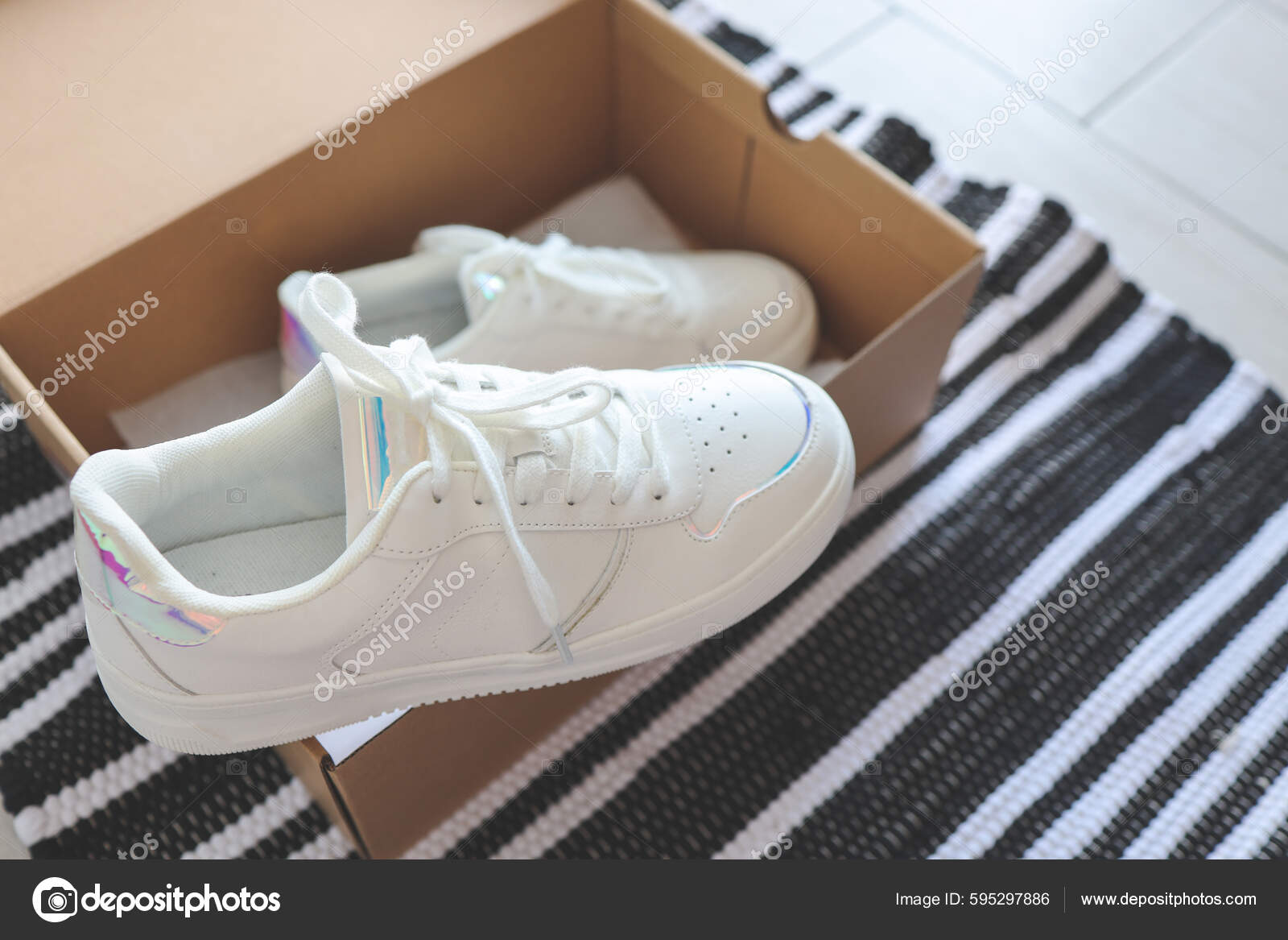Women's Sneakers Open Shoe Box Unpacking Top View — Stock Photo © Plusstudio #595297886