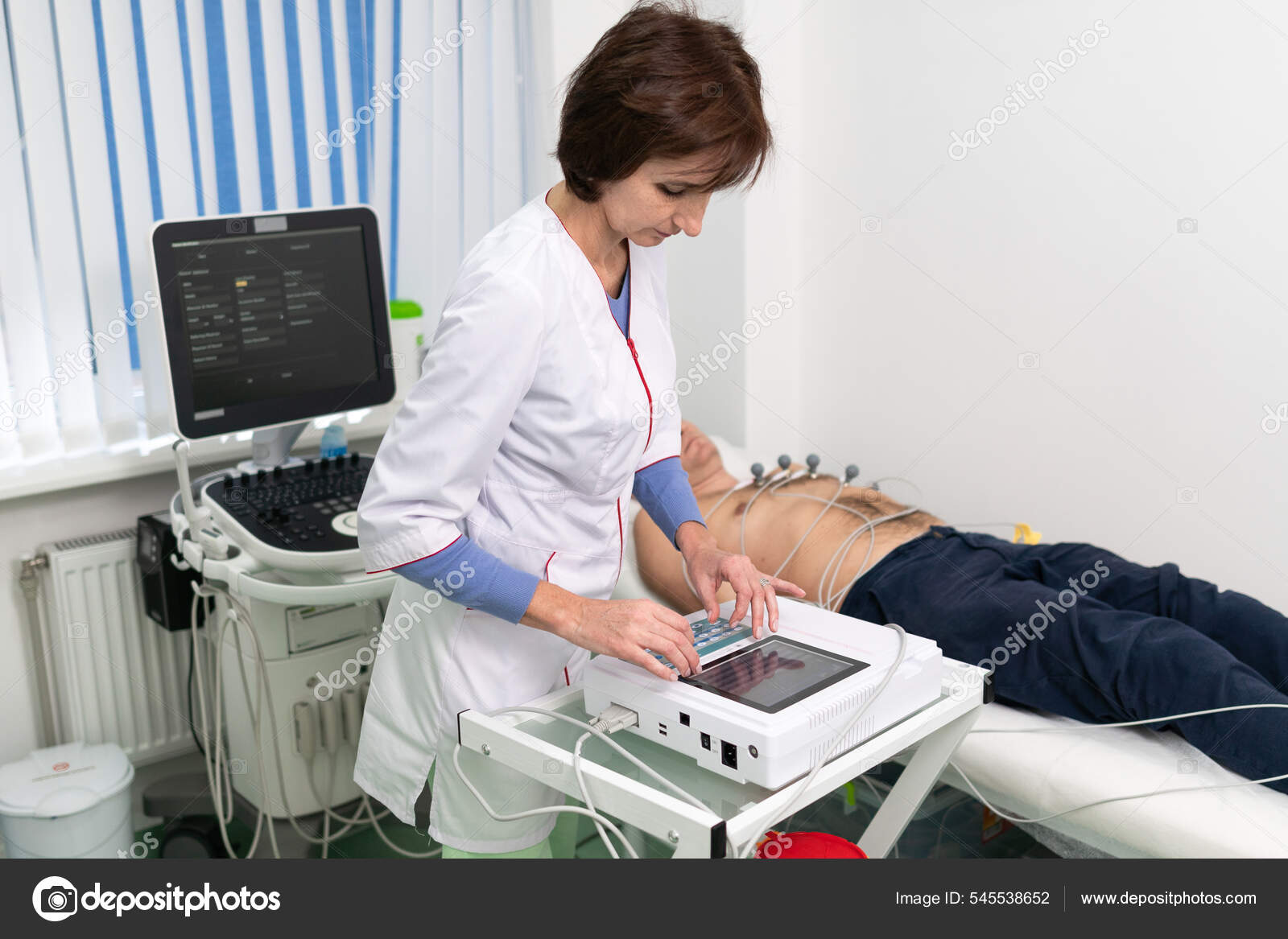 Cardiologist Doctor Performs Electrocardiography Procedure Man Lying ...