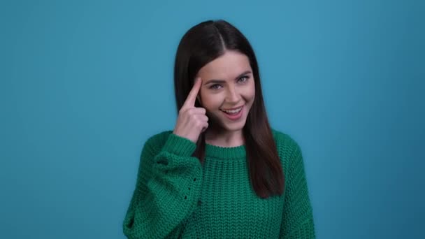 Lovely lady finger forehead solution wink isolated dark blue color ...