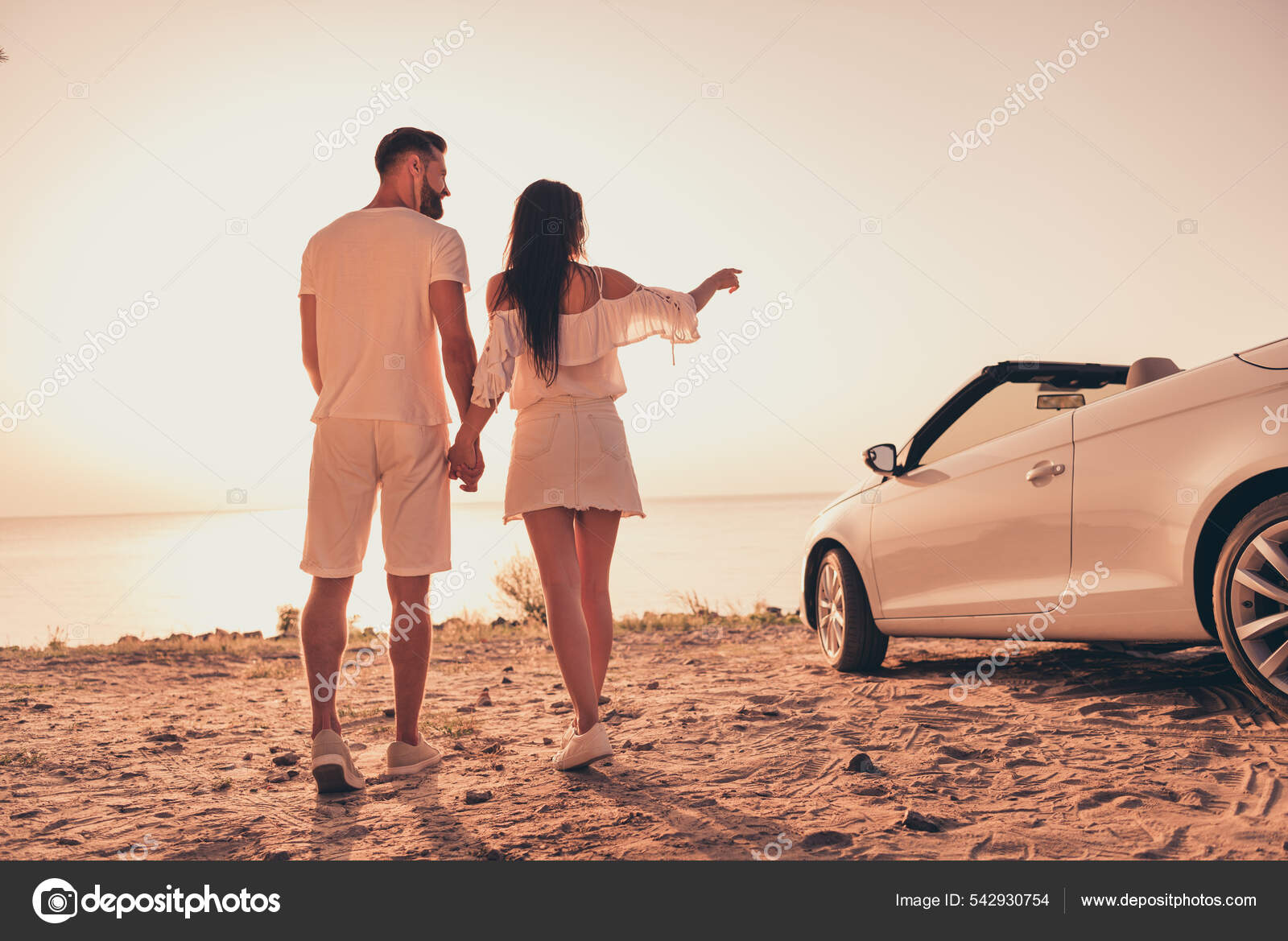 Back rear view full body photo of young couple seaside journey car ...