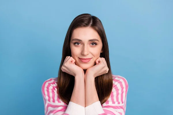 Photo of calm friendly person arms touch cheeks look camera isolated on ...