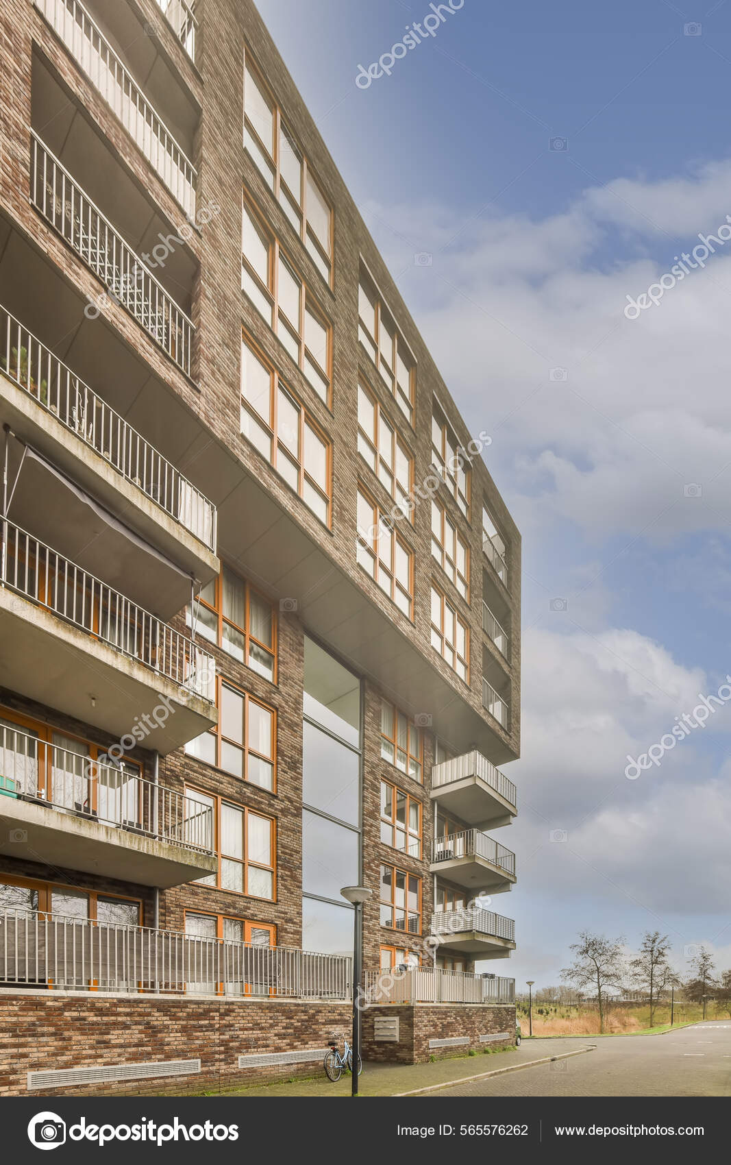 A residential building built of light and dark bricks — Stock Photo ...