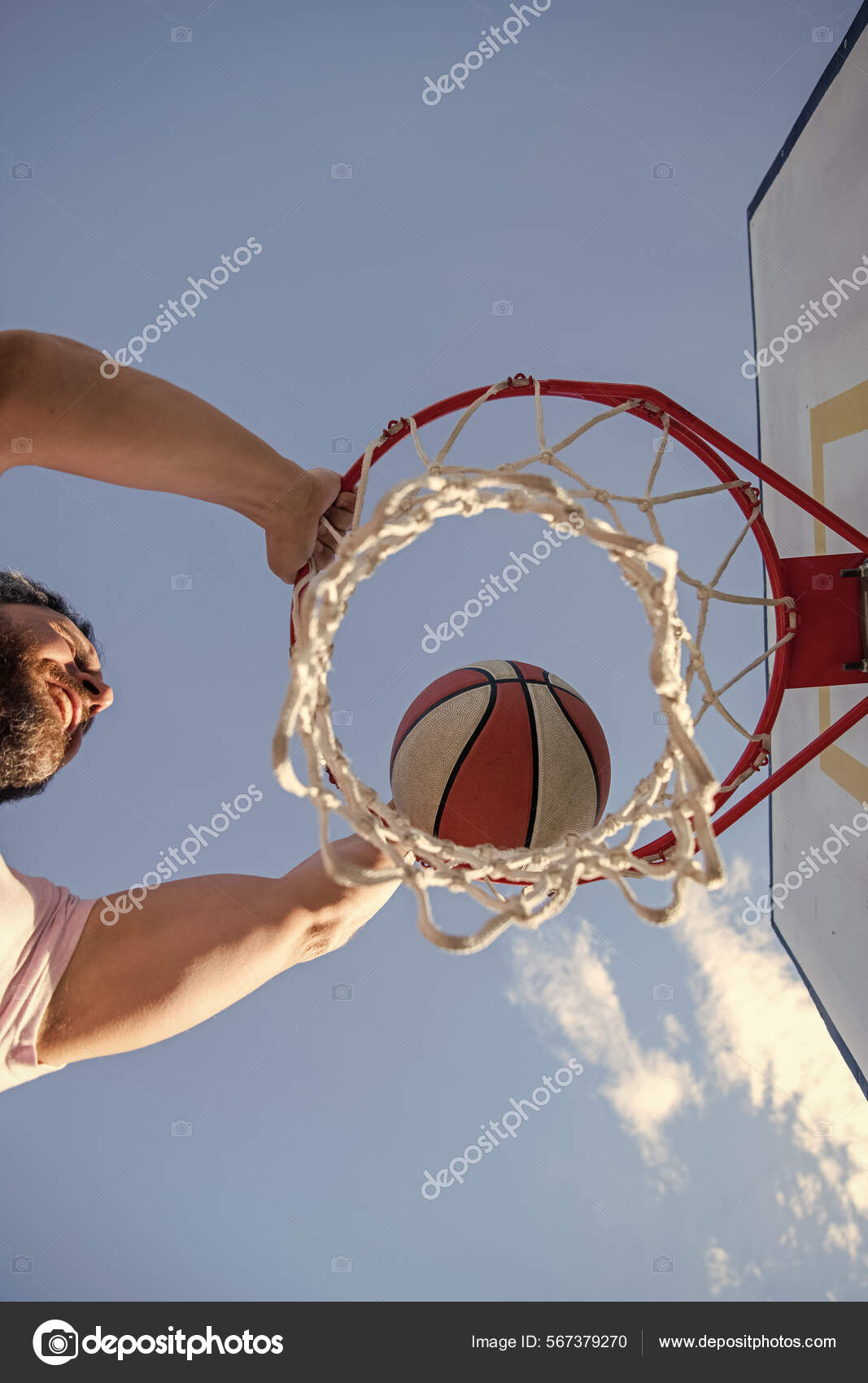 Slam dunk in motion. top view. summer activity. man with basketball ...
