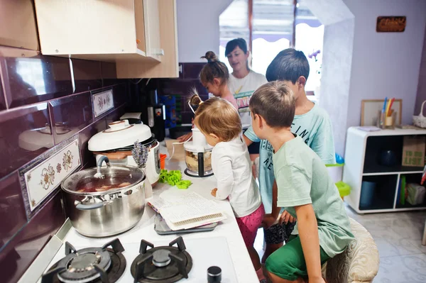 Family around kitchen Stock Photos, Royalty Free Family around kitchen ...